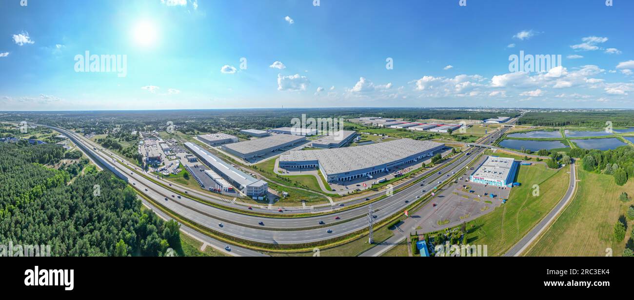 Logistics park with warehouse. Semi-trailers trucks standing on car ...