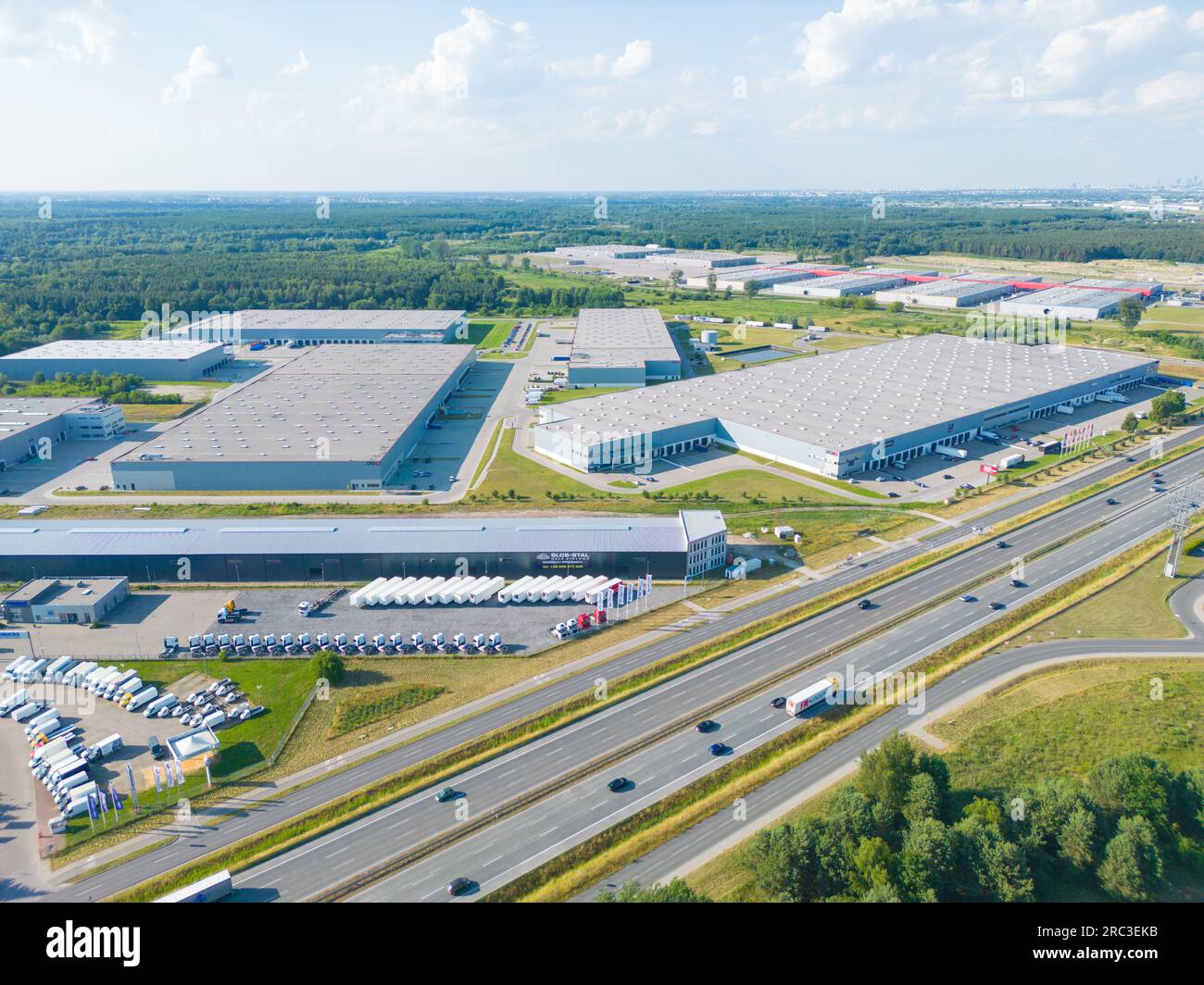 Aerial view of the logistics park with warehouse, loading hub and many ...