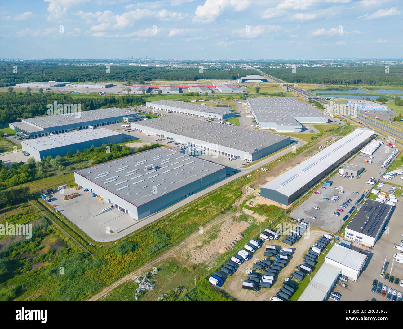 Aerial view of the logistics park with warehouse, loading hub and many ...