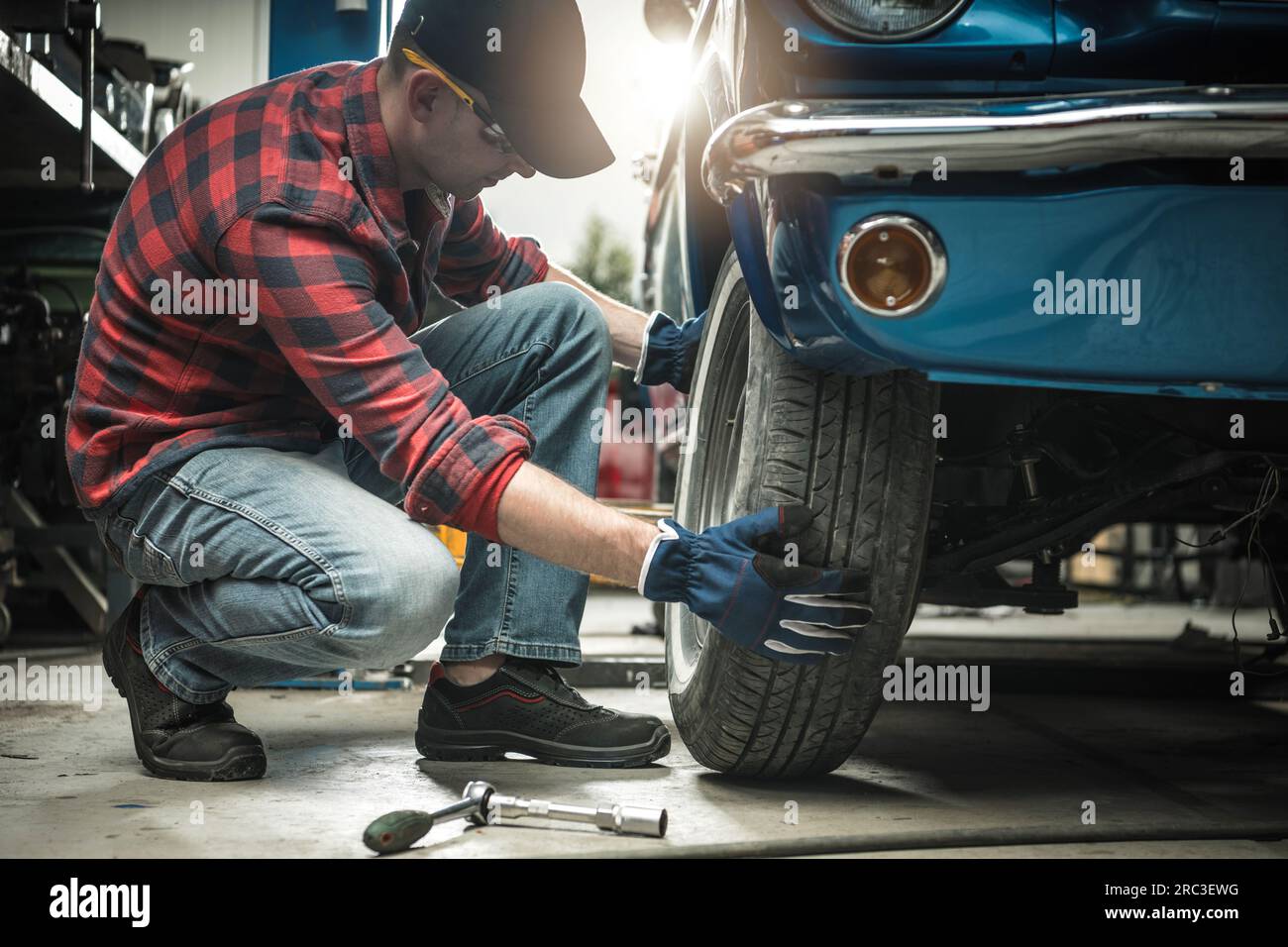 Caucasian Professional Classic Cars Restoration Worker Replacing a ...