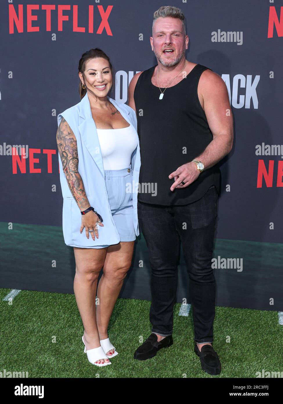 HOLLYWOOD, LOS ANGELES, CALIFORNIA, USA - JULY 11: Samantha McAfee and Pat McAfee arrive at the ...