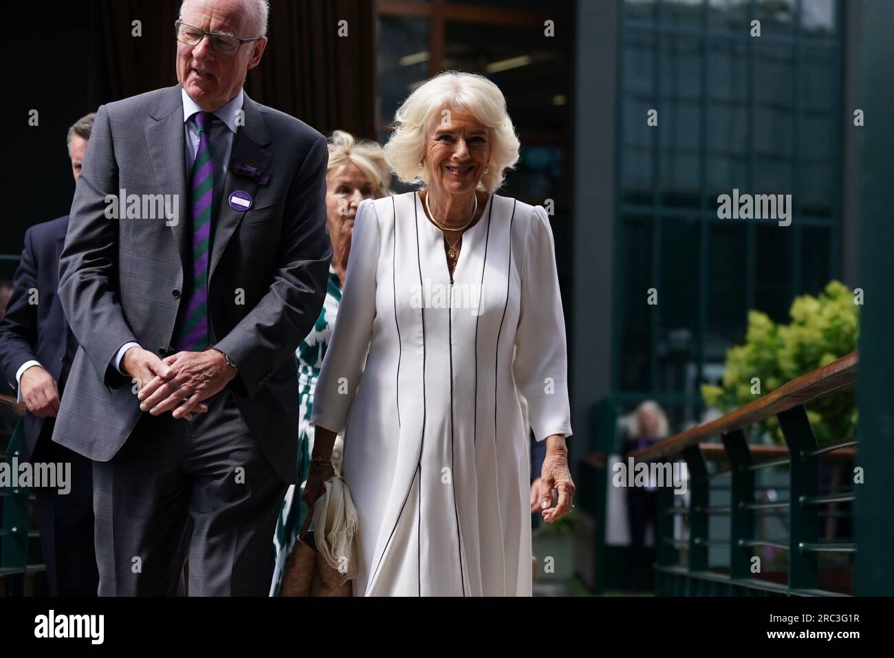 Queen camilla with aeltc chairman, ian hewitt as she arrives for her ...
