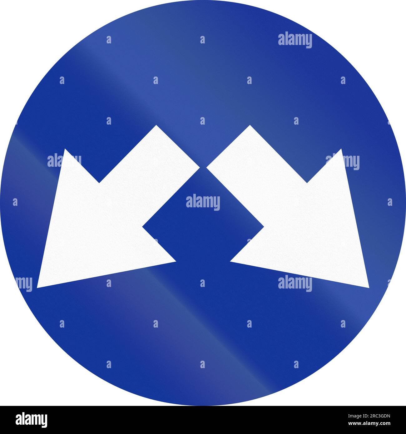 Polish traffic sign: Keep left or right Stock Photo - Alamy