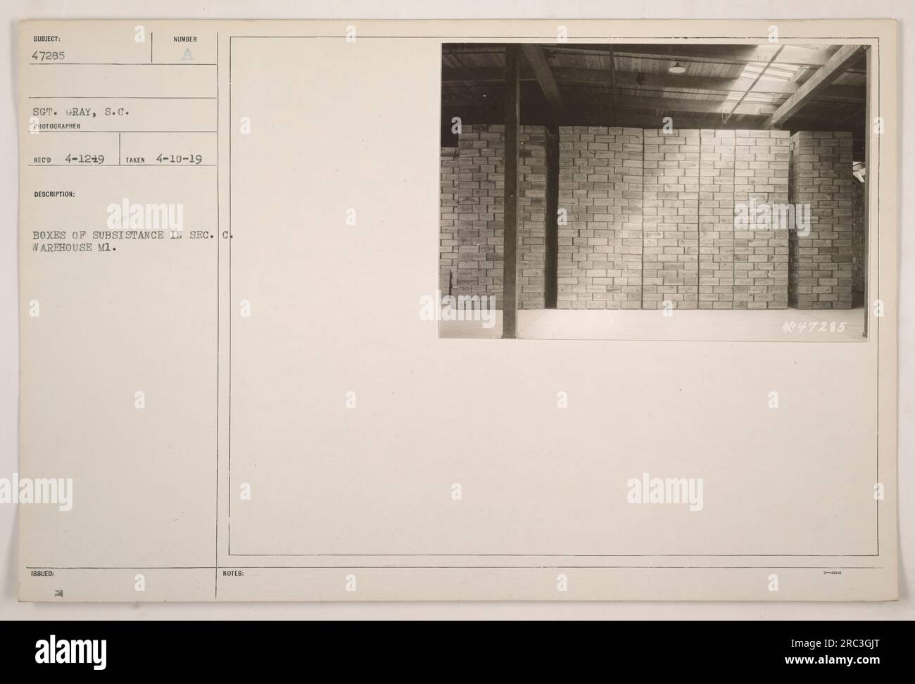 Image depicting boxes of subsistence in Section C, Warehouse M1 during ...