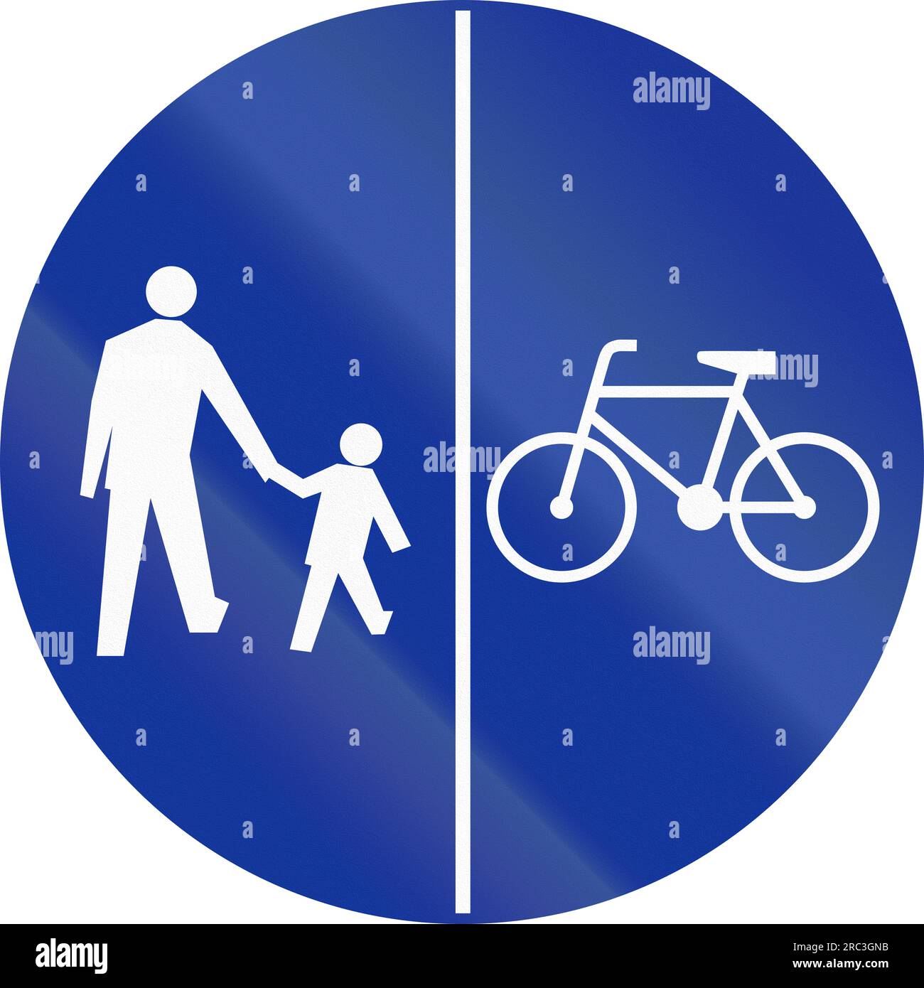 Polish traffic sign on a shared-use path with separate lanes, right ...