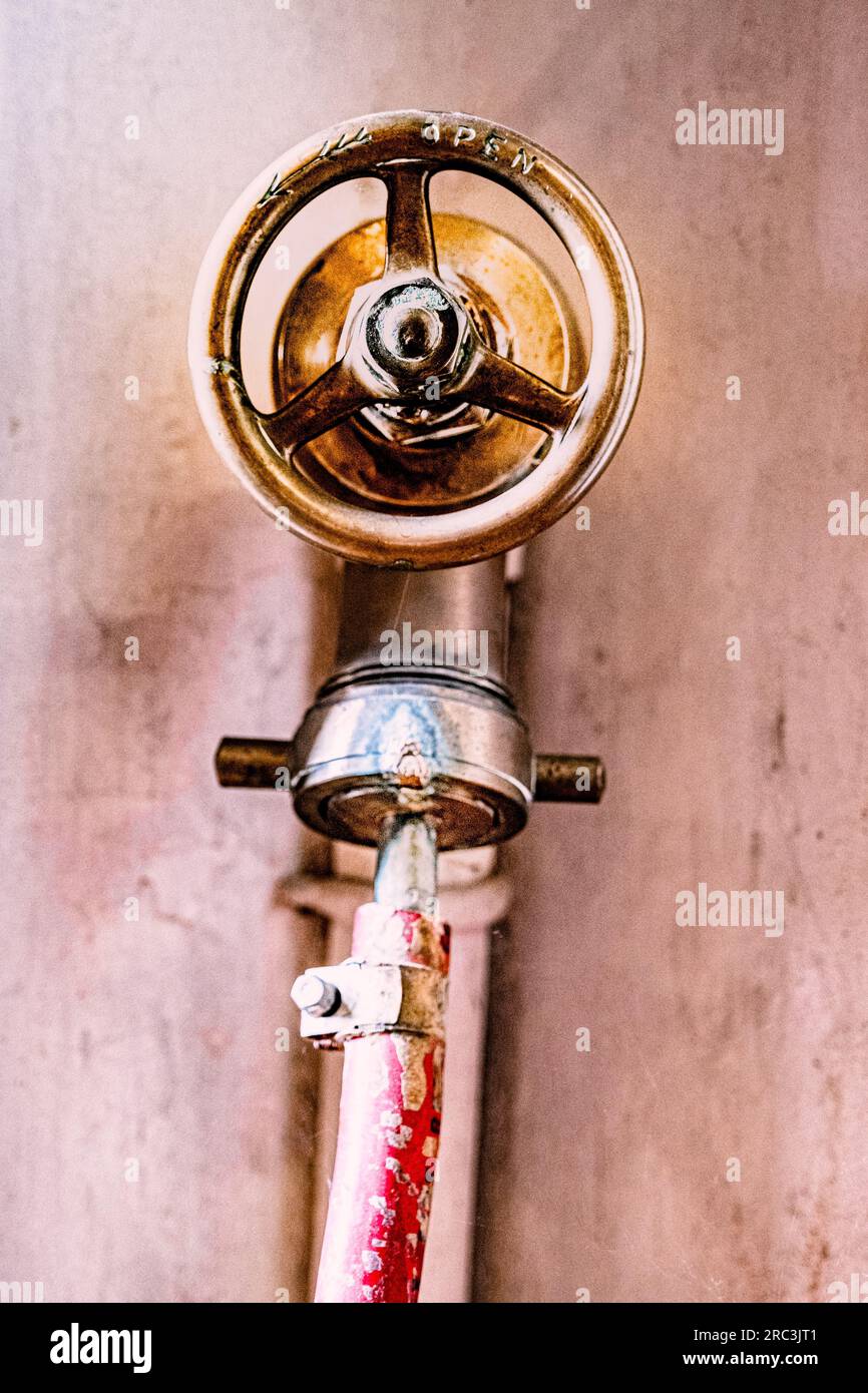 Vintage fire hose valve in an English stately home Stock Photo - Alamy