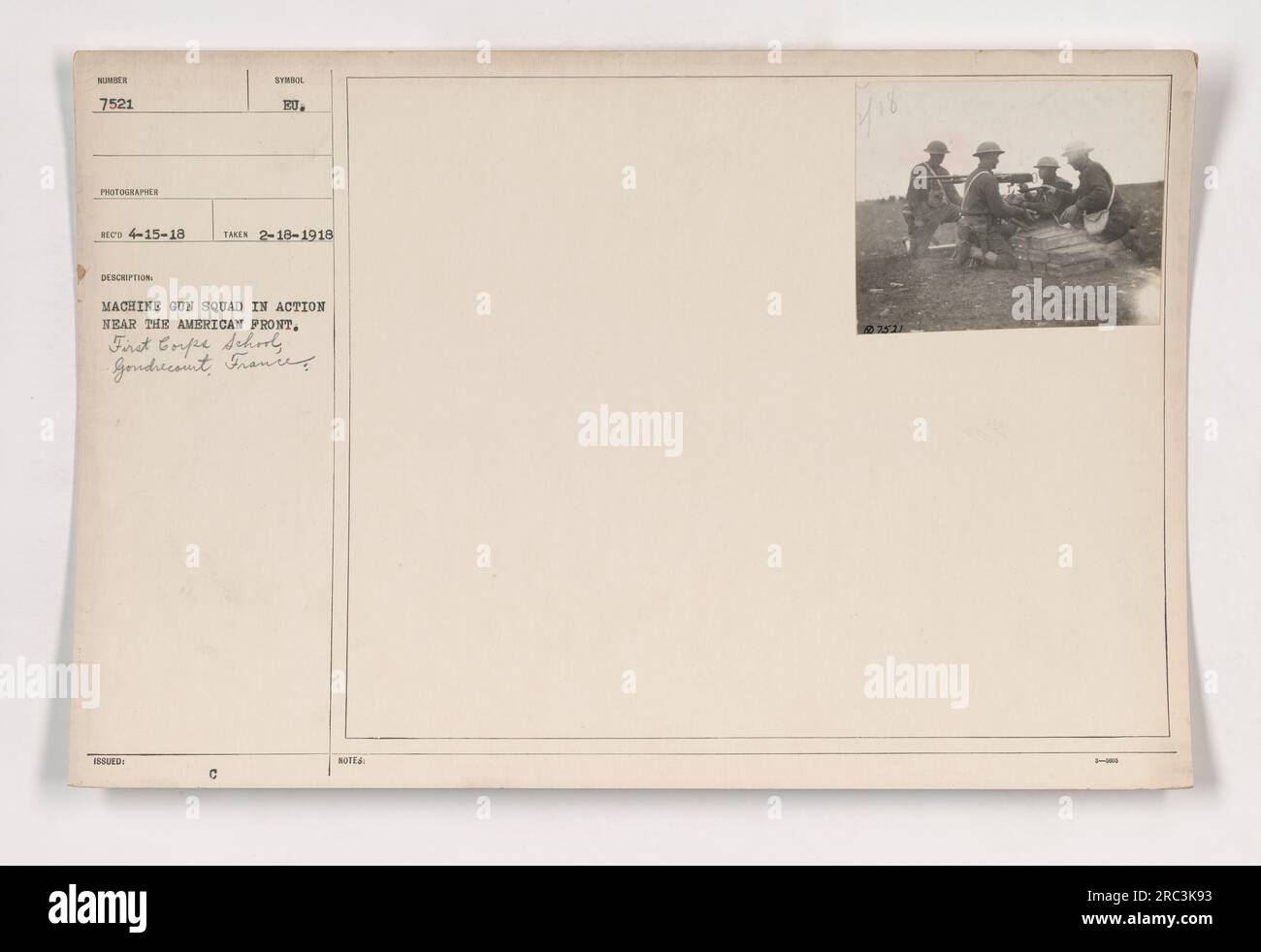 Machine-gun squad in action near the American front during World War I ...