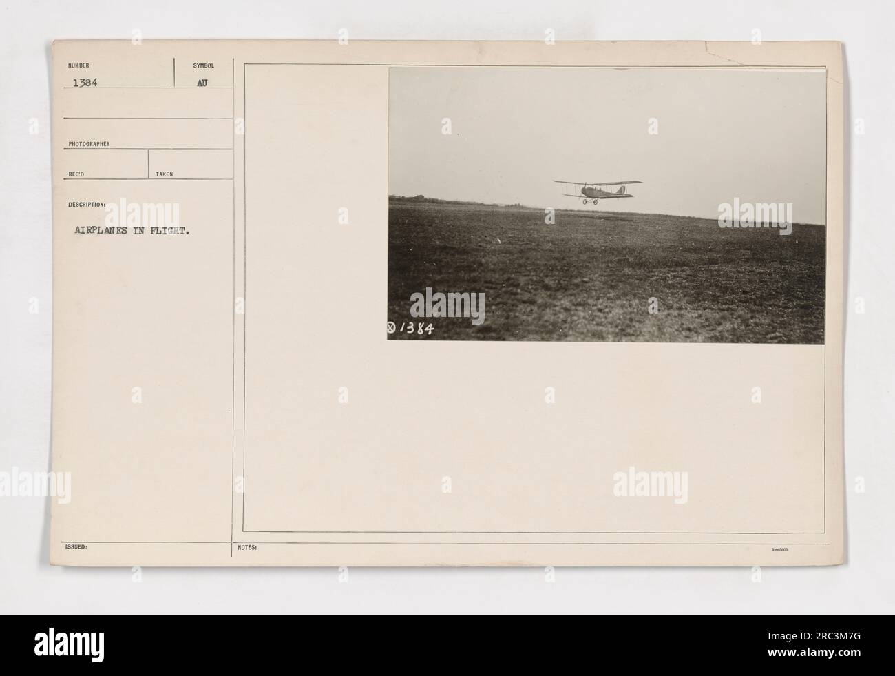 A member of the American Air Army lands safely on the ground after ...