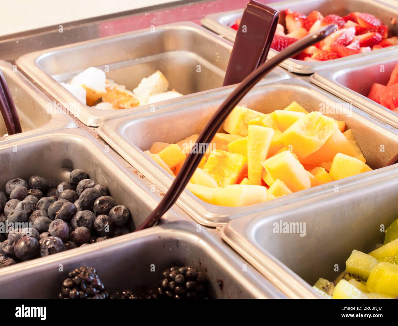 Frozen yogurt topping Stock Photo - Alamy