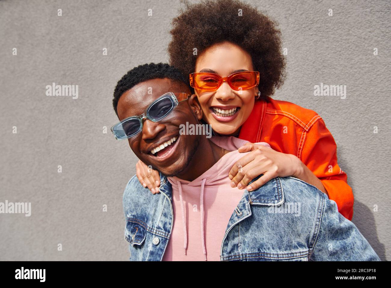 Portrait of cheerful young african american woman with natural hair ...