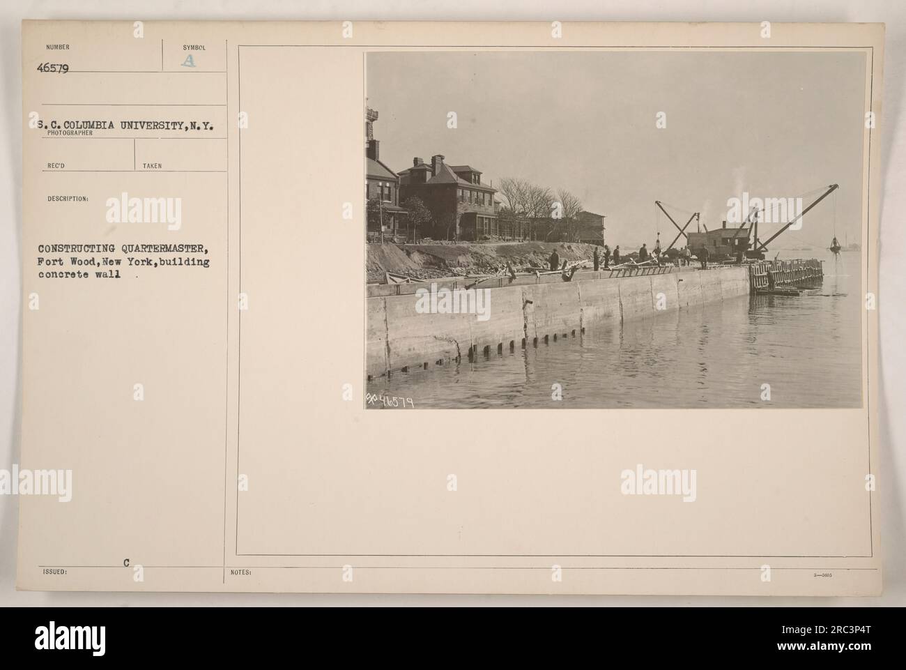 Soldiers constructing a concrete wall at Fort Wood, New York. This ...
