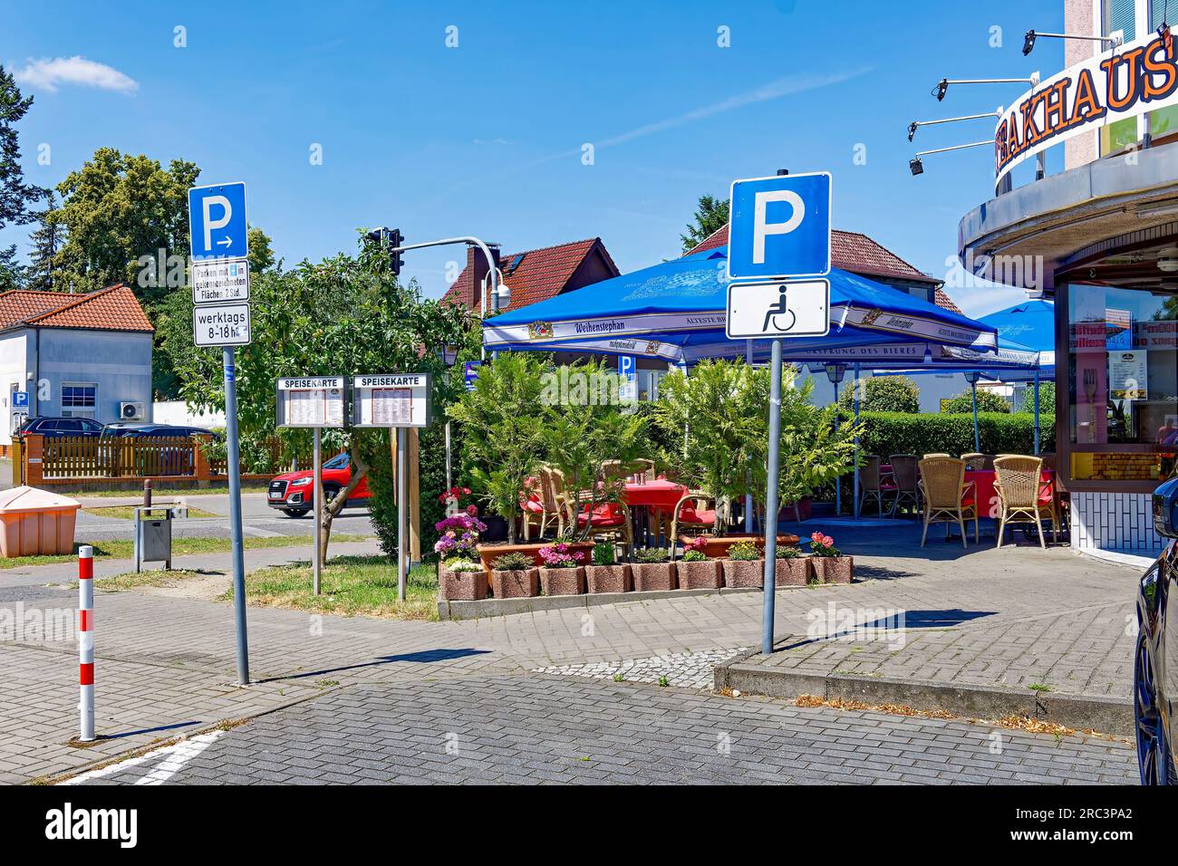 Mahlow, Germany - July 11, 2023: Traffic sign in a parking lot with an ...