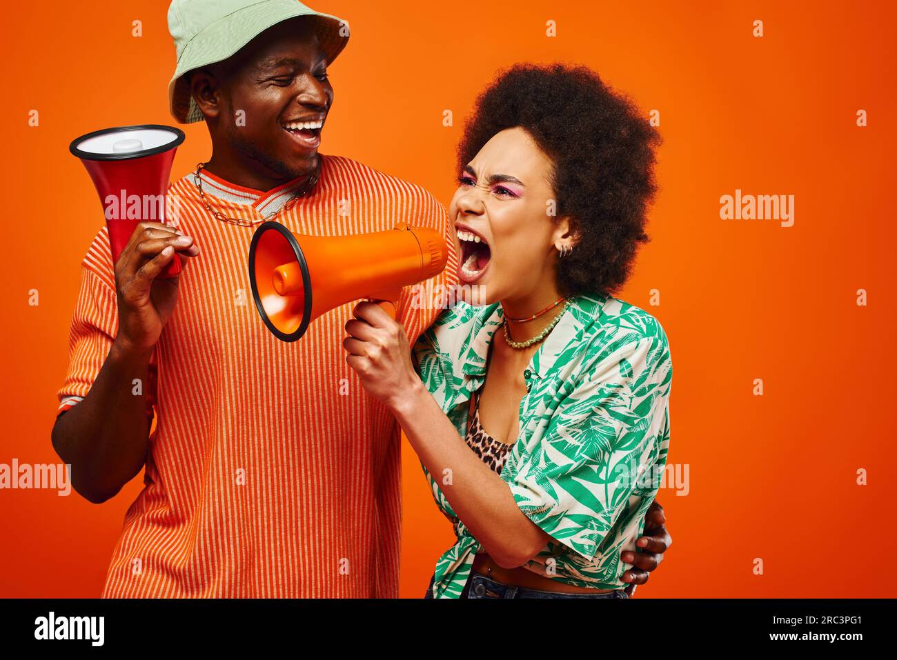 Cheerful positive man with loudspeaker hi-res stock photography and ...