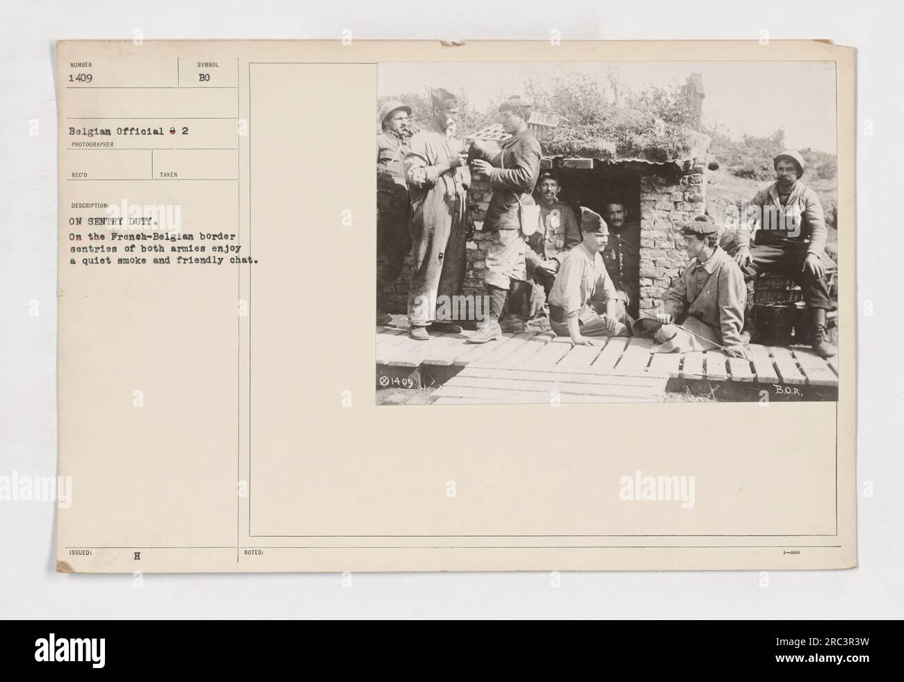 Sentries on the French-Belgian border engage in friendly conversation ...