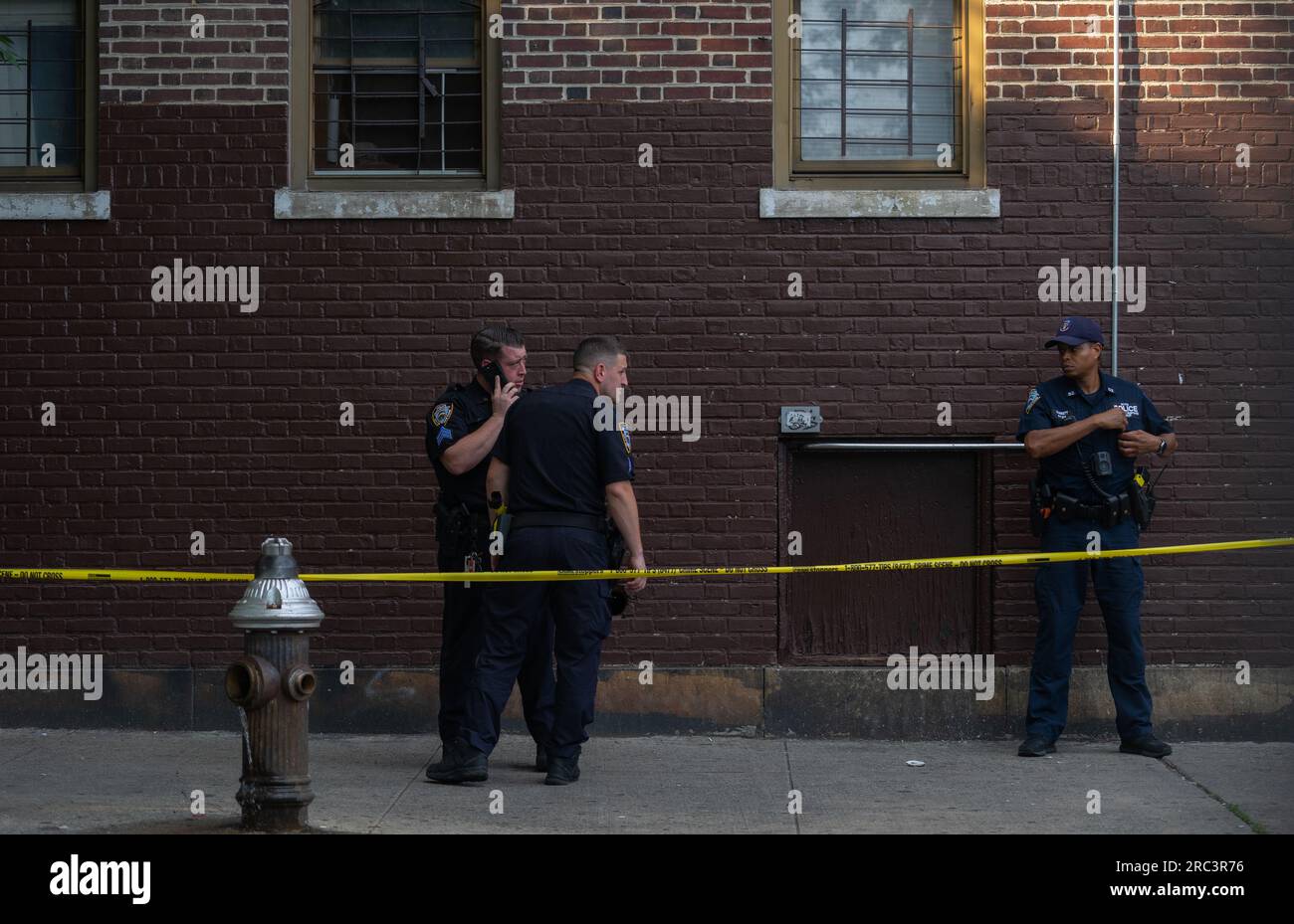 Police officers from the 52nd Precinct and detectives are investigating ...
