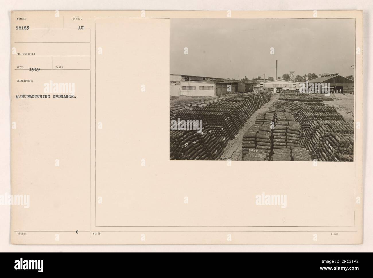 Image shows American soldiers working in a factory, manufacturing ...