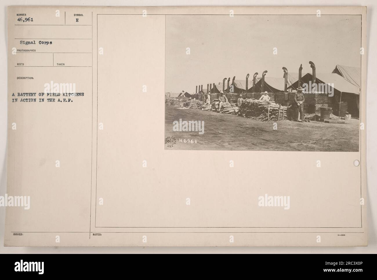A battery of field kitchens is seen in action, serving the soldiers of ...