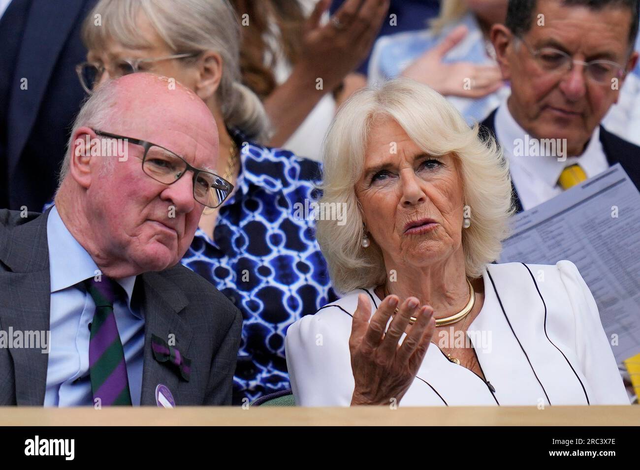 Britain's Queen Camilla speaks with Ian Hewitt, the chairman of the ...