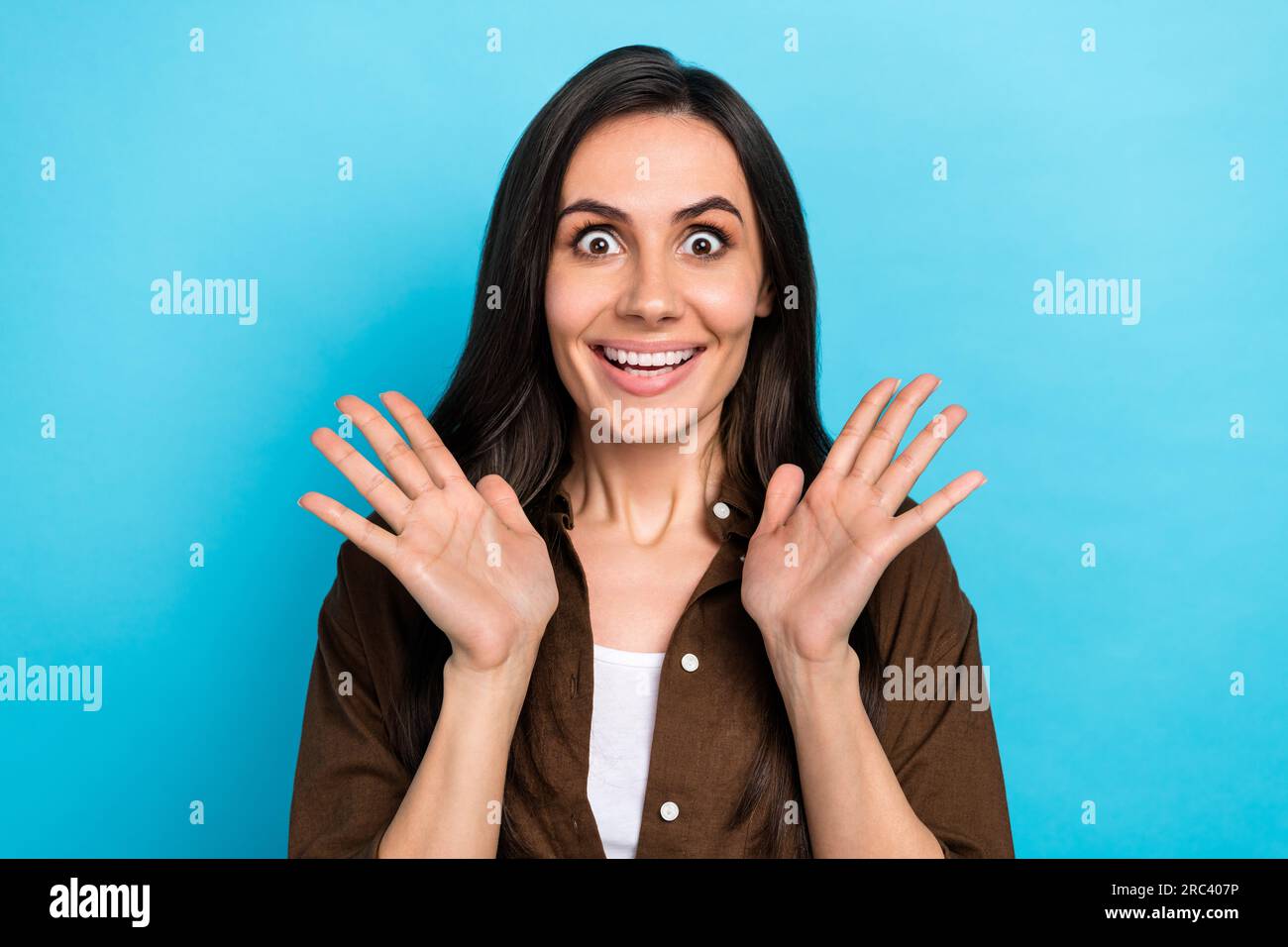 Photo of overjoyed funny young girl raised palms shocked reaction ...
