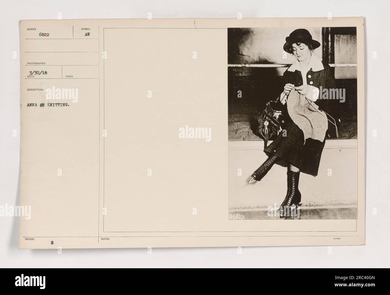 During World War One, Anna Ou is seen engaged in knitting a hat ...