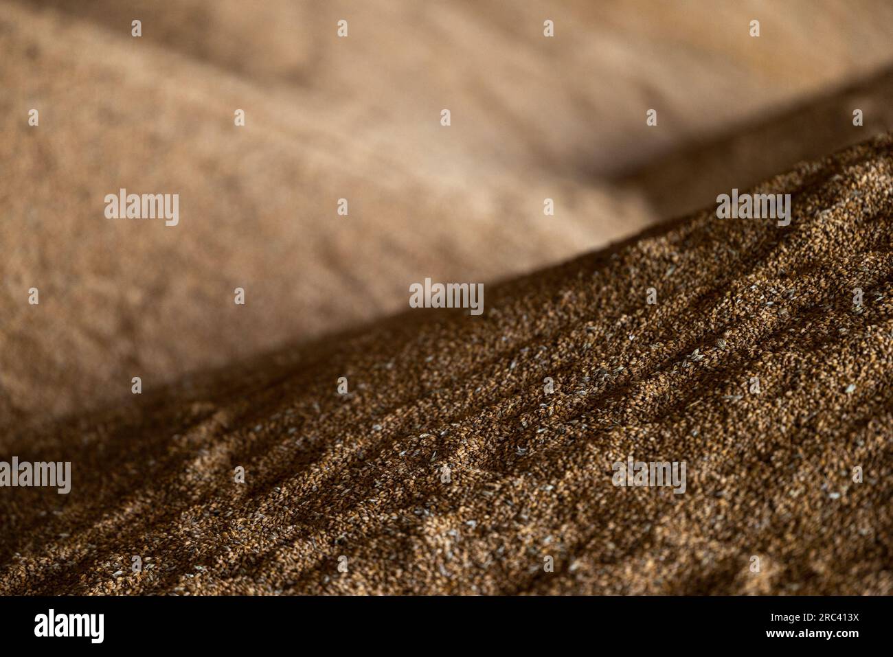 Piles of wheat grains at mill storage or grain elevator. The main ...