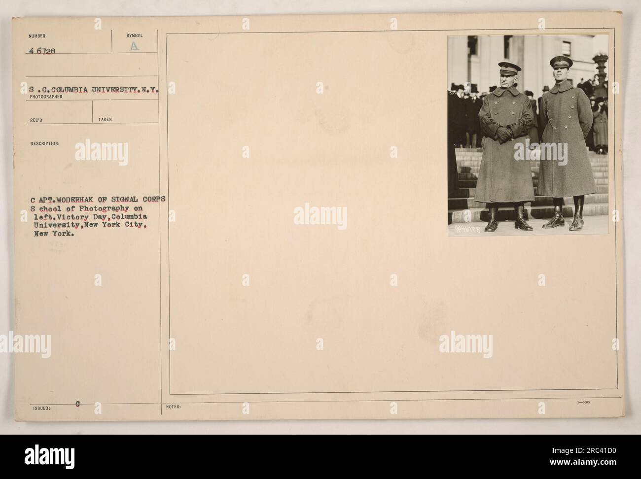 Caption: Captain Moderhak of the Signal Corps School of Photography is ...