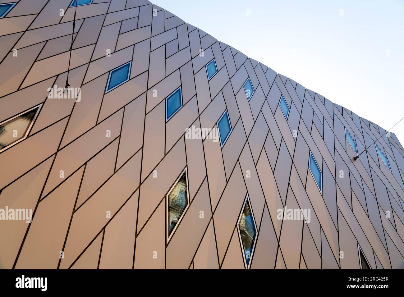 Close up detail from a modern building facade with geometric rhombus ...