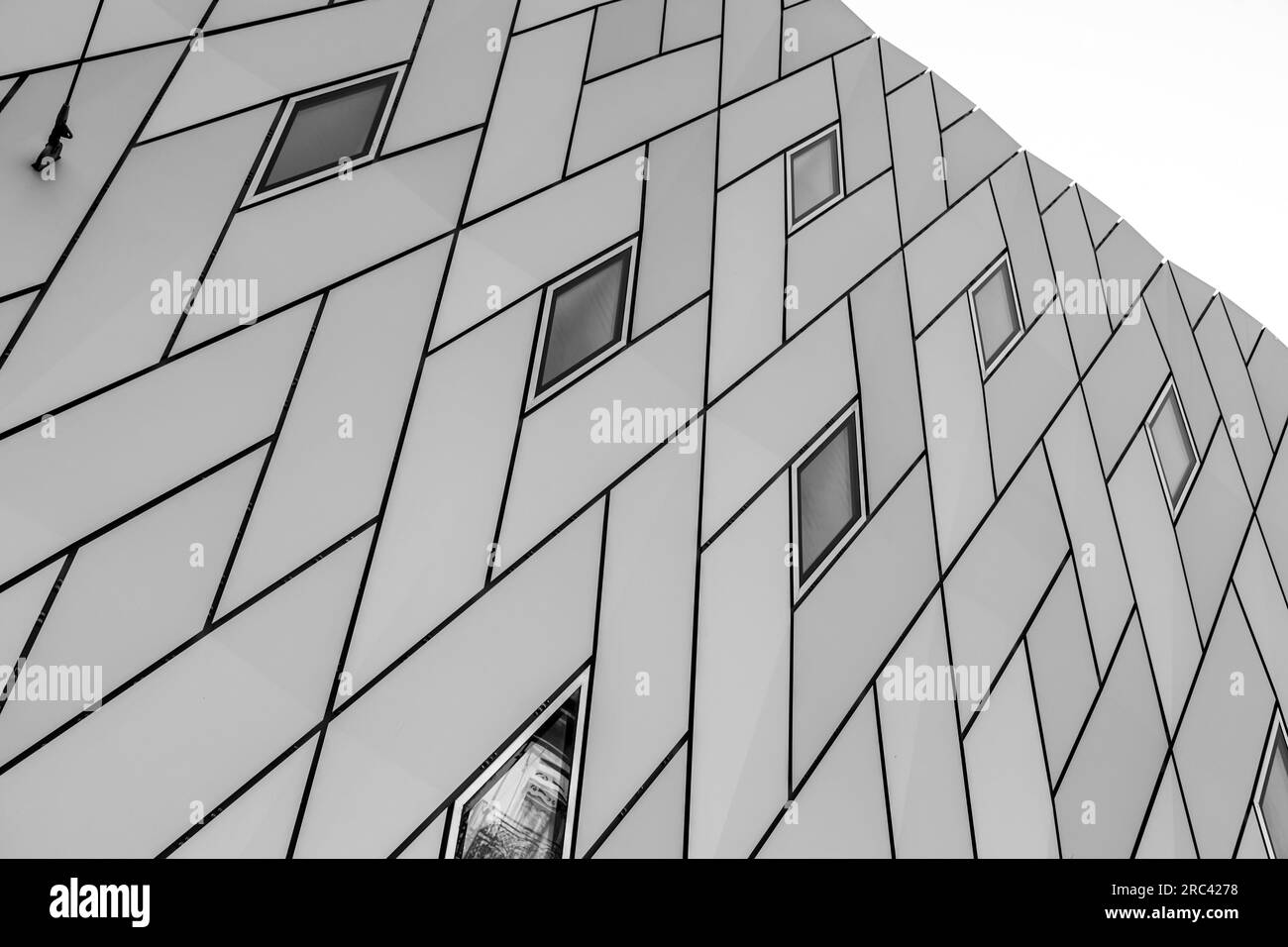 Close up detail from a modern building facade with geometric rhombus pattern, architectural ...