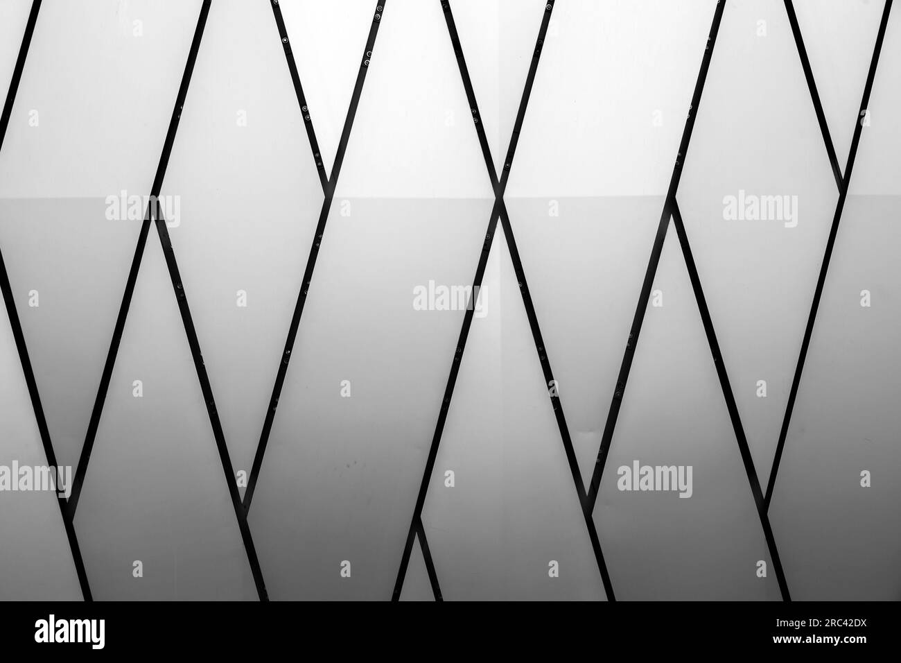 Close up detail from a modern building facade with geometric rhombus ...