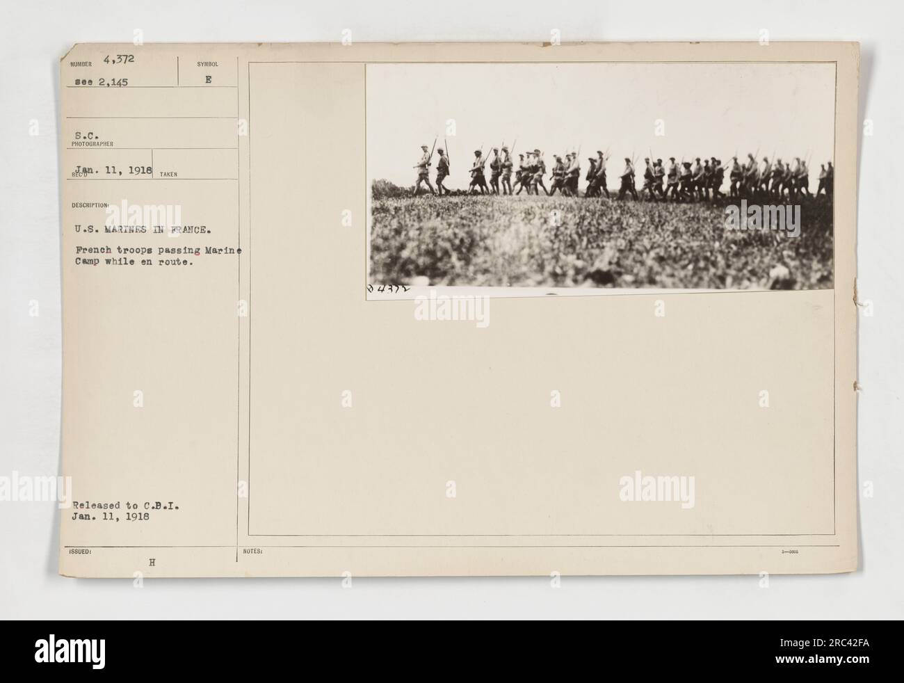 U.S. Marines in France during World War I. French troops passing Marine ...