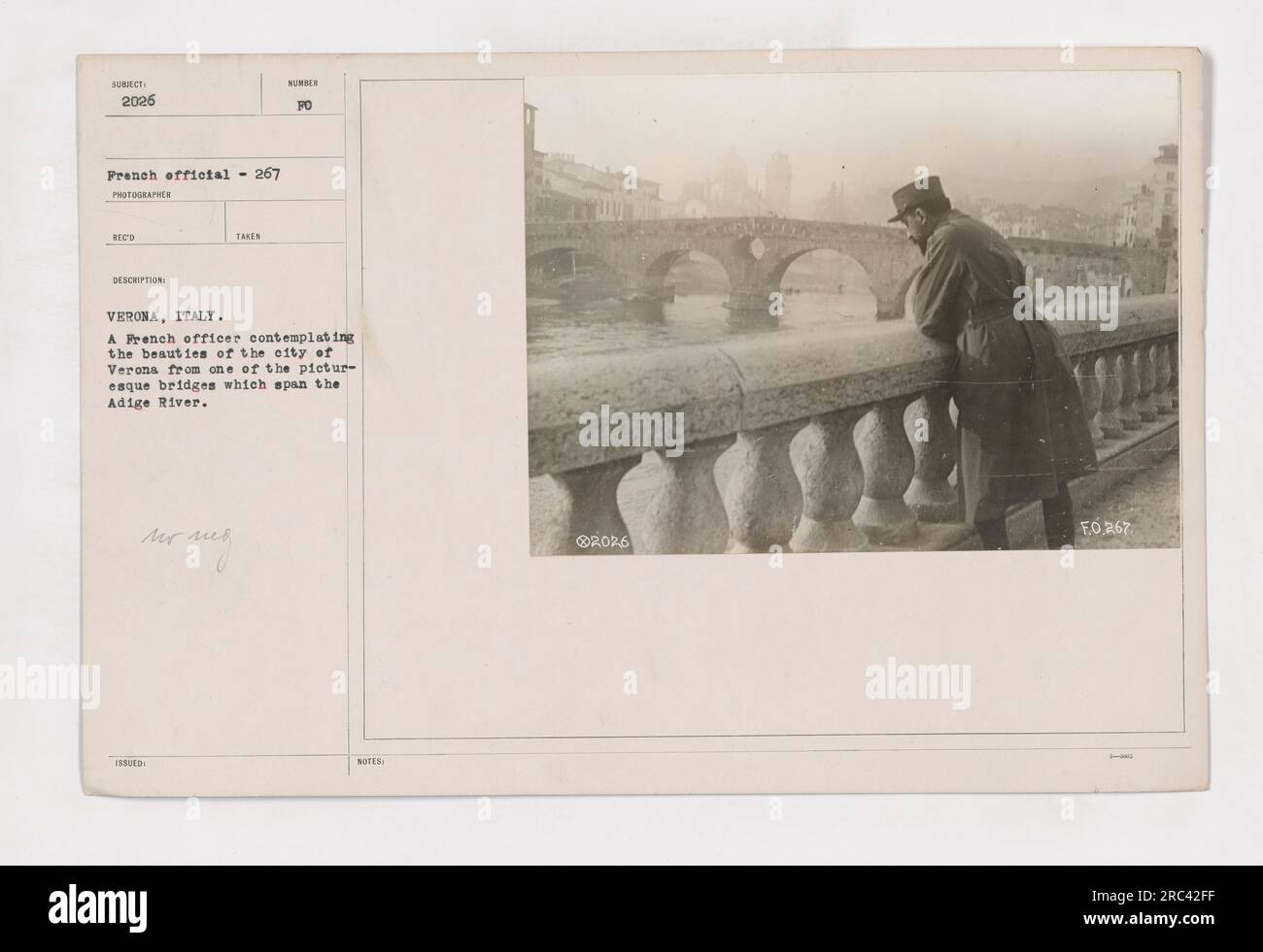 Soldiers constructing a pontoon bridge across the muddy flats of ...