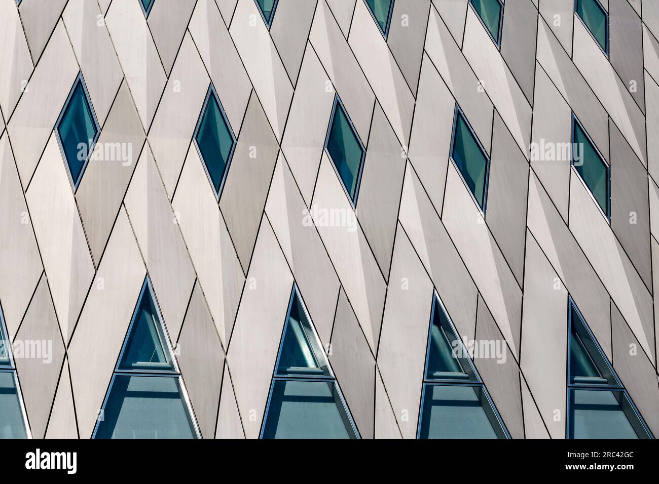 Close up detail from a modern building facade with geometric rhombus ...