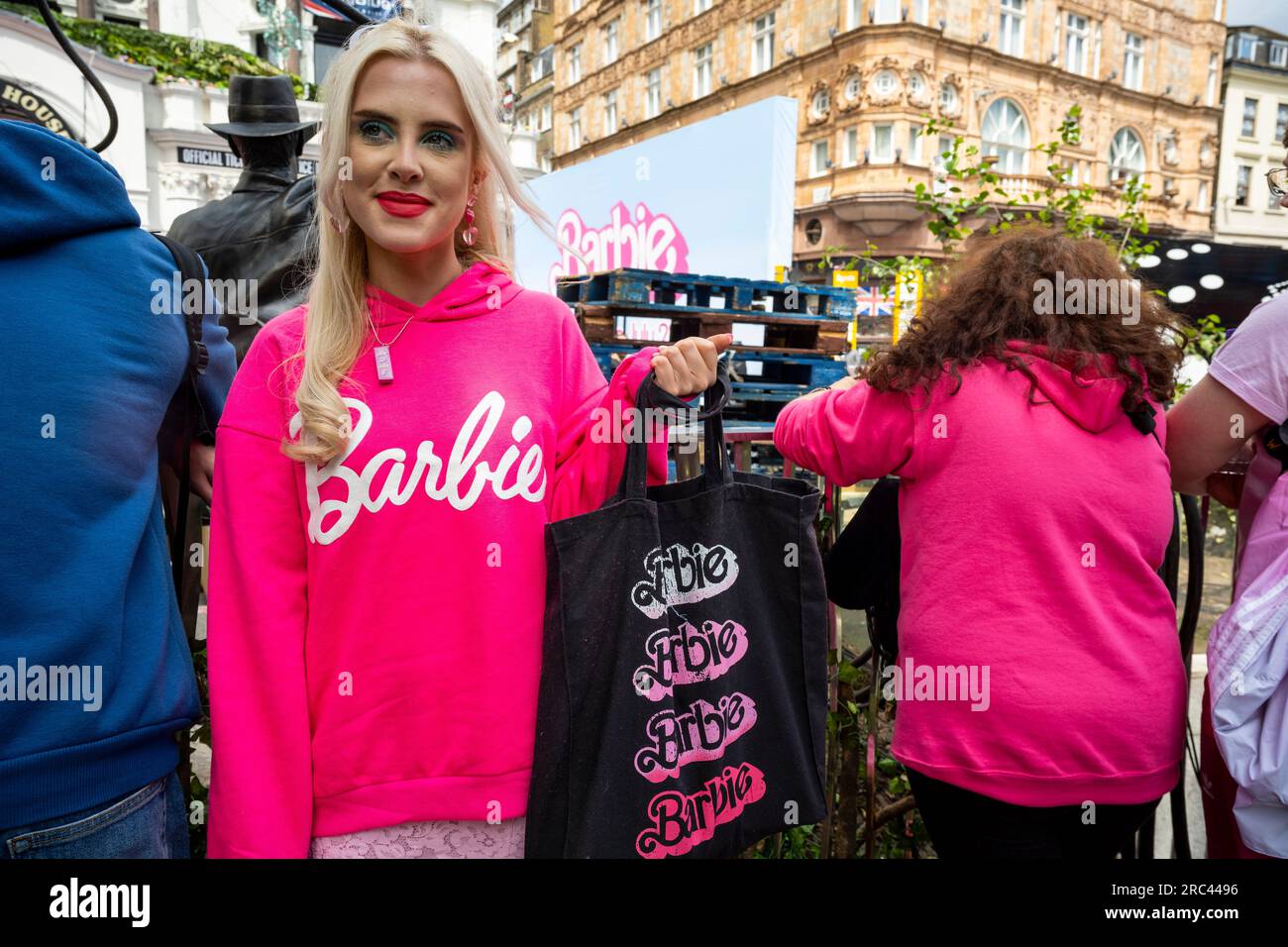 London, UK. 12 July 2023. Emily from Staines, a Barbie fan, in ...