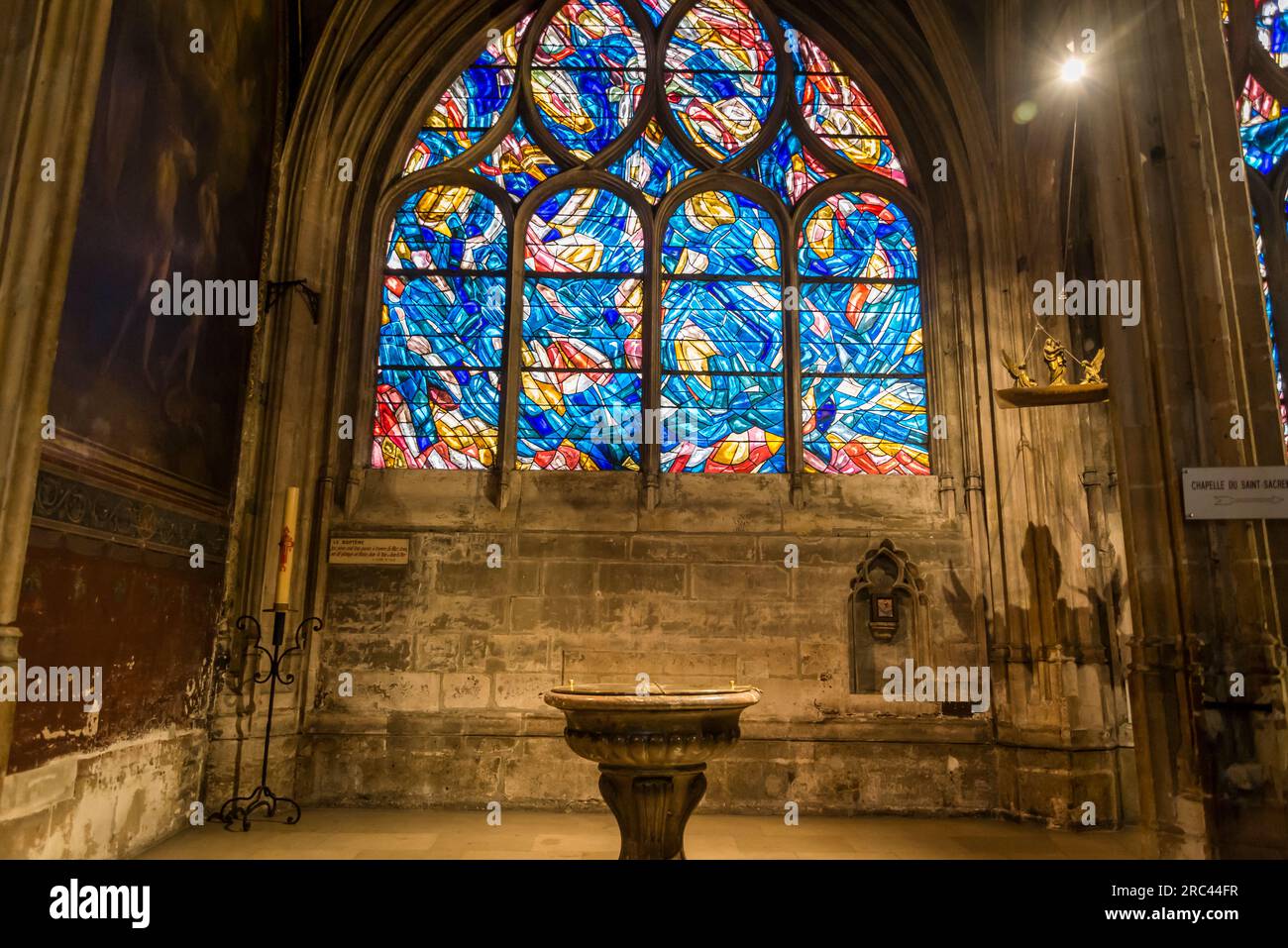 Baptism font in the Church of Saint-Séverin, a Roman Catholic church in ...