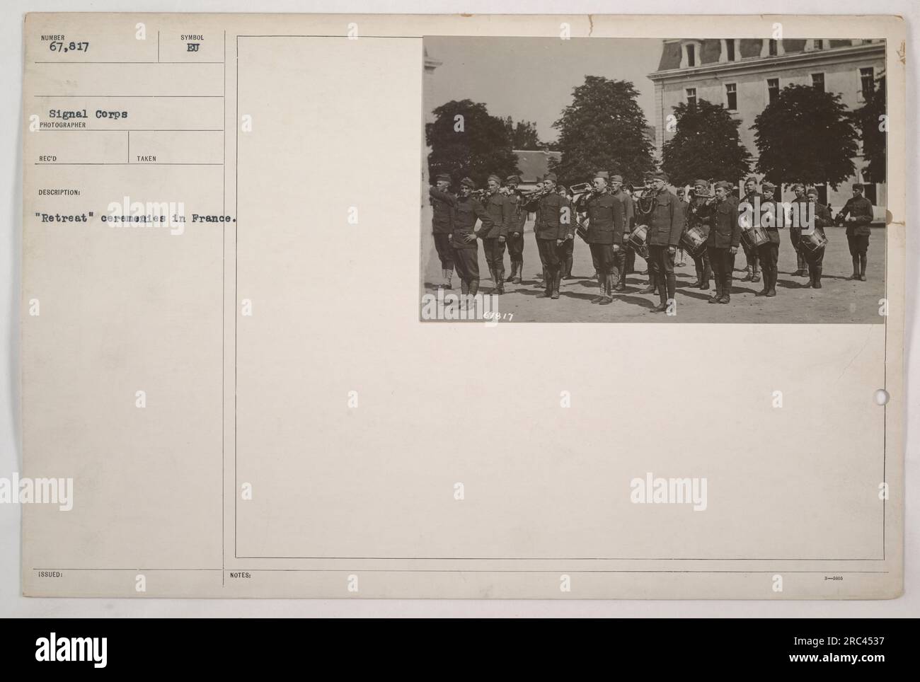 Soldiers participating in a "Retreat" ceremony in France during World ...