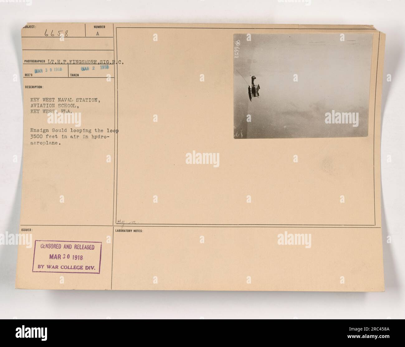 Ensign Gould performing a loop maneuver in a hydroaeroplane at an ...