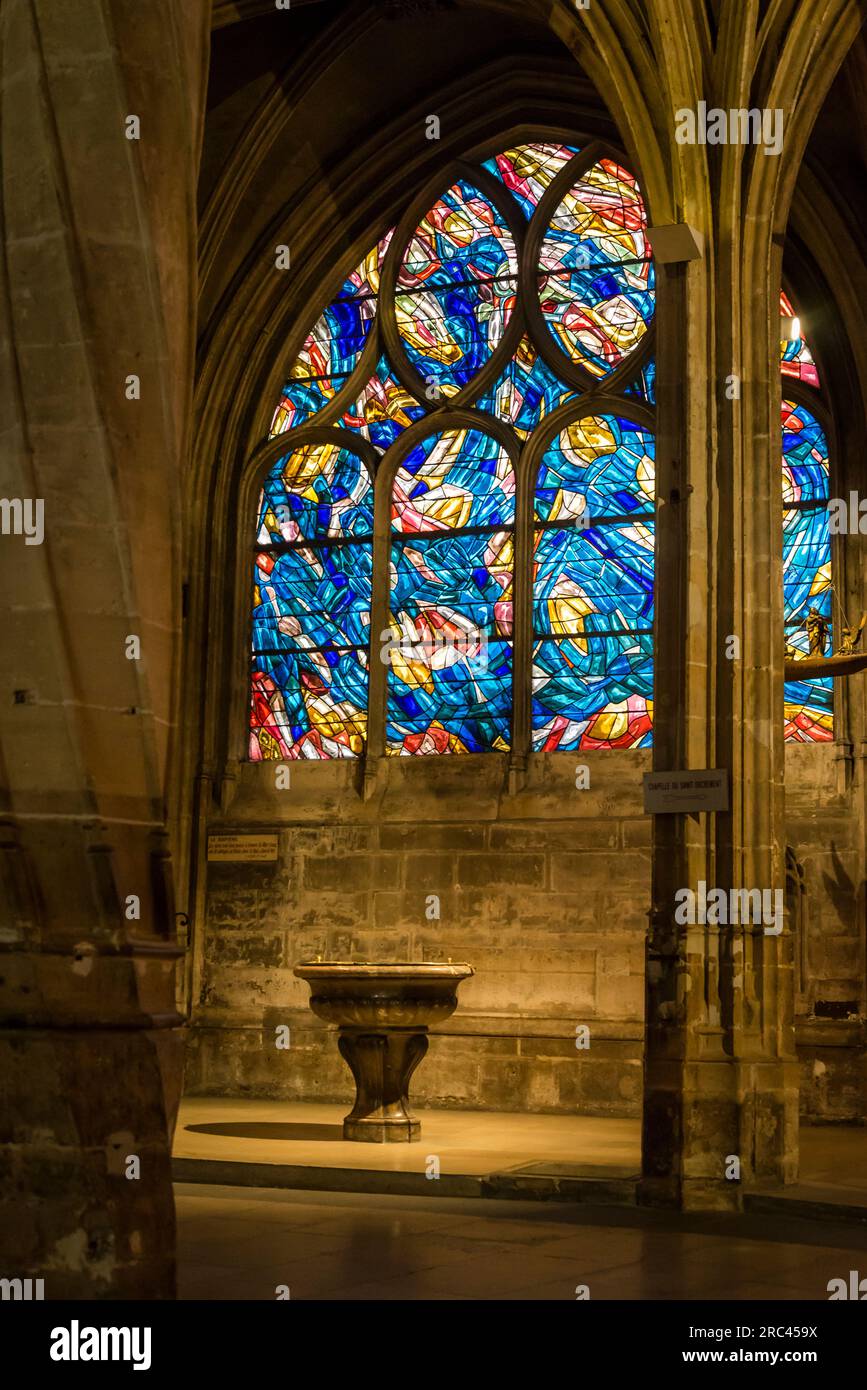 Baptism font in the Church of Saint-Séverin, a Roman Catholic church in ...