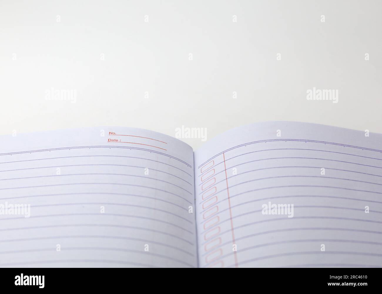 Open notebooks isolated on white background Stock Photo - Alamy