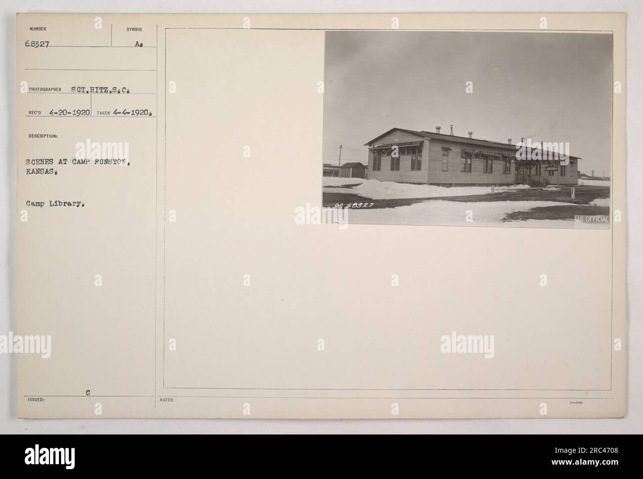 Soldiers gather at the camp library in Camp Funston, Kansas. The photo ...