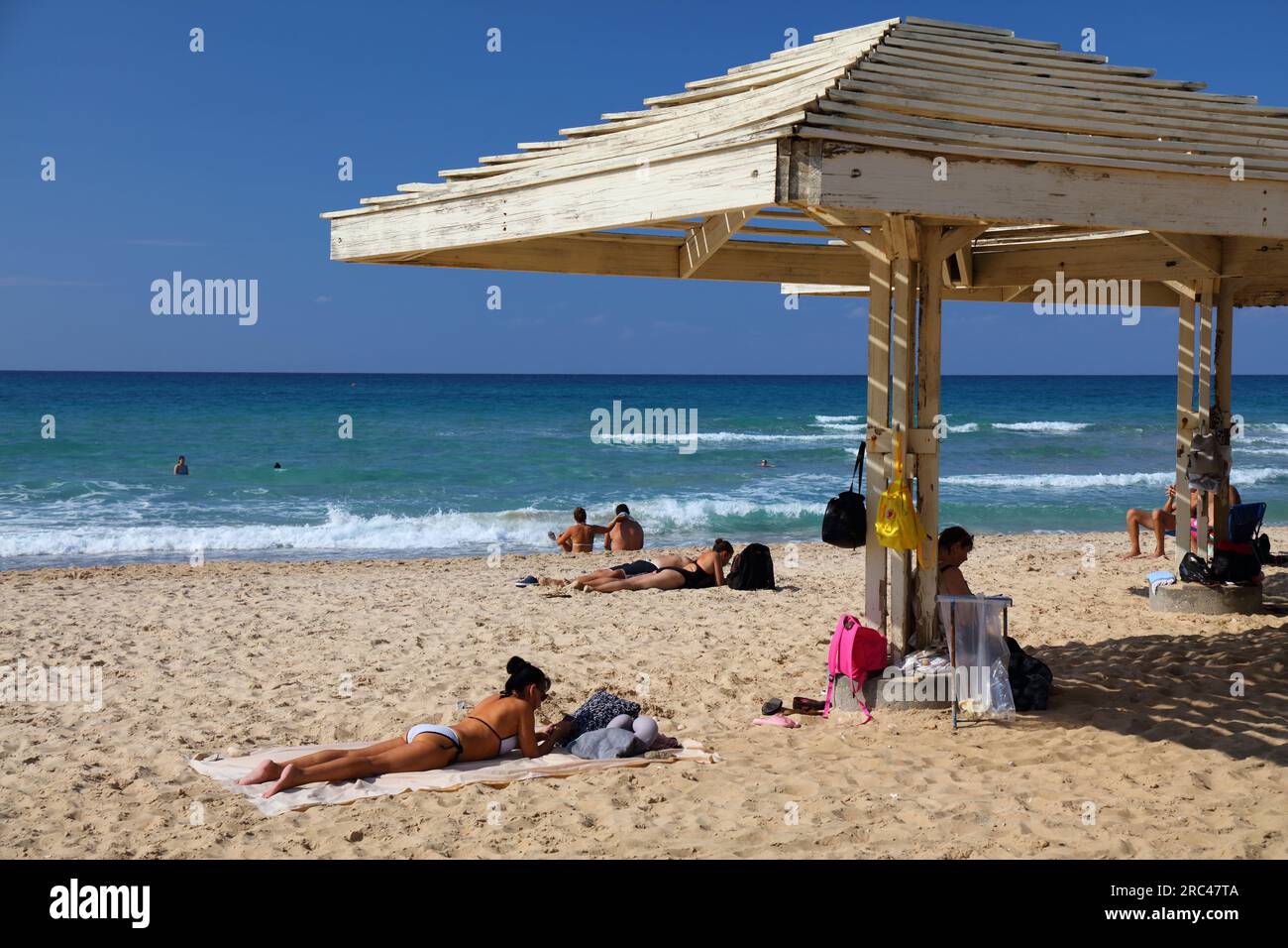 HAIFA, ISRAEL - NOVEMBER 1, 2022: People visit sandy Dado Beach in ...