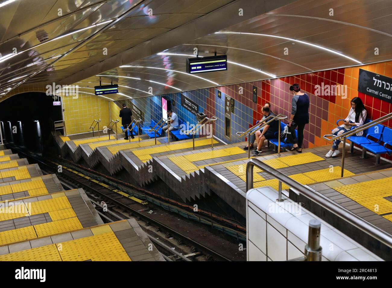 HAIFA, ISRAEL - OCTOBER 31, 2022: People wait for Carmelit underground ...