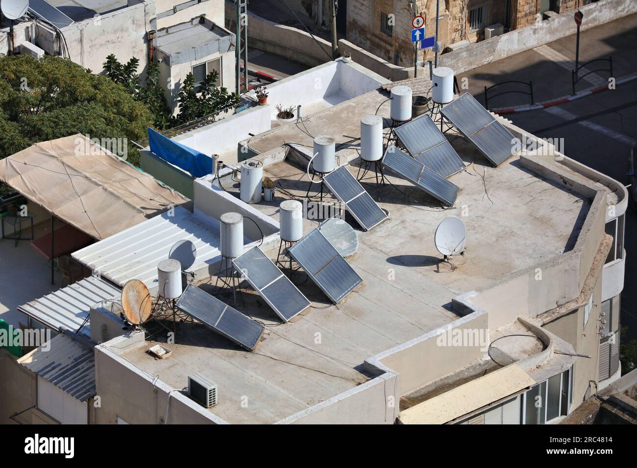 Roof solar powered water heating in Haifa, Israel Stock Photo - Alamy