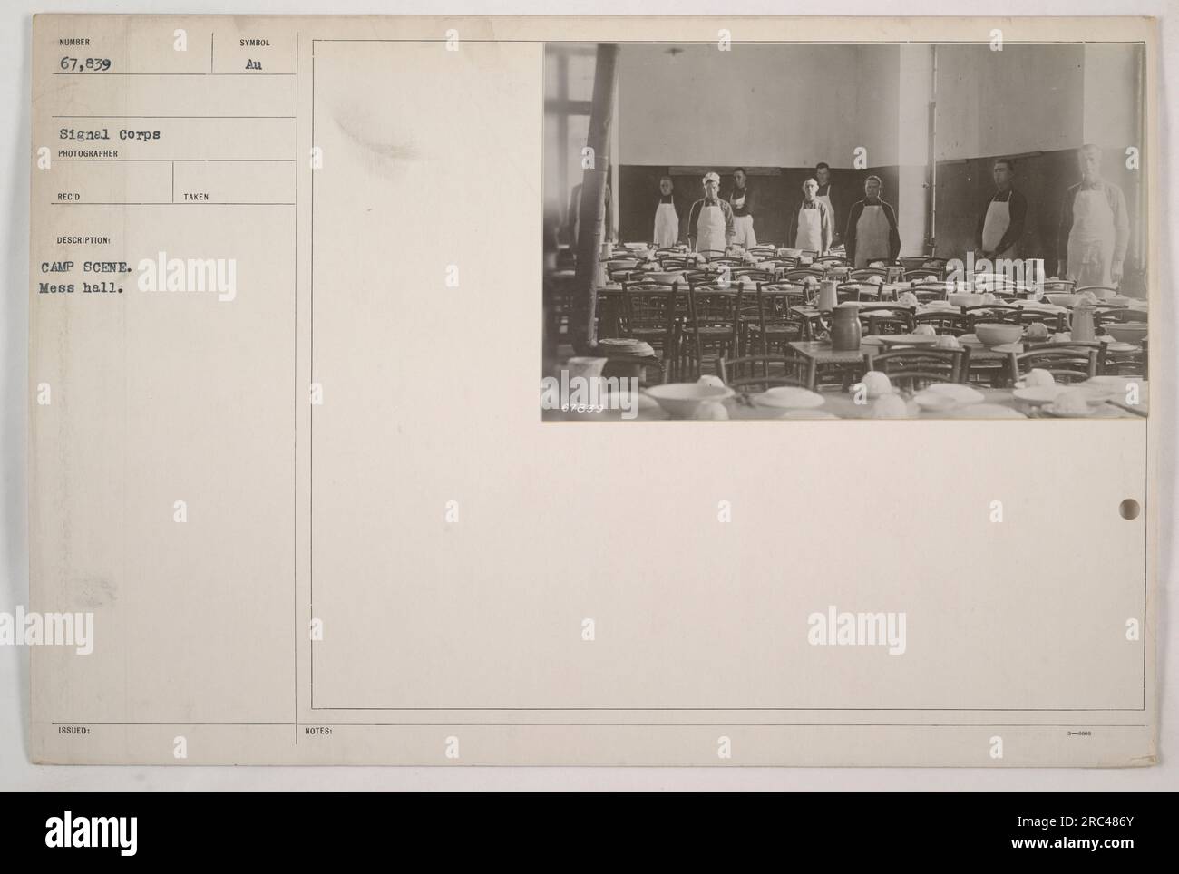 Soldiers lining up for food at Mess Hall number 67,839 in a camp during ...
