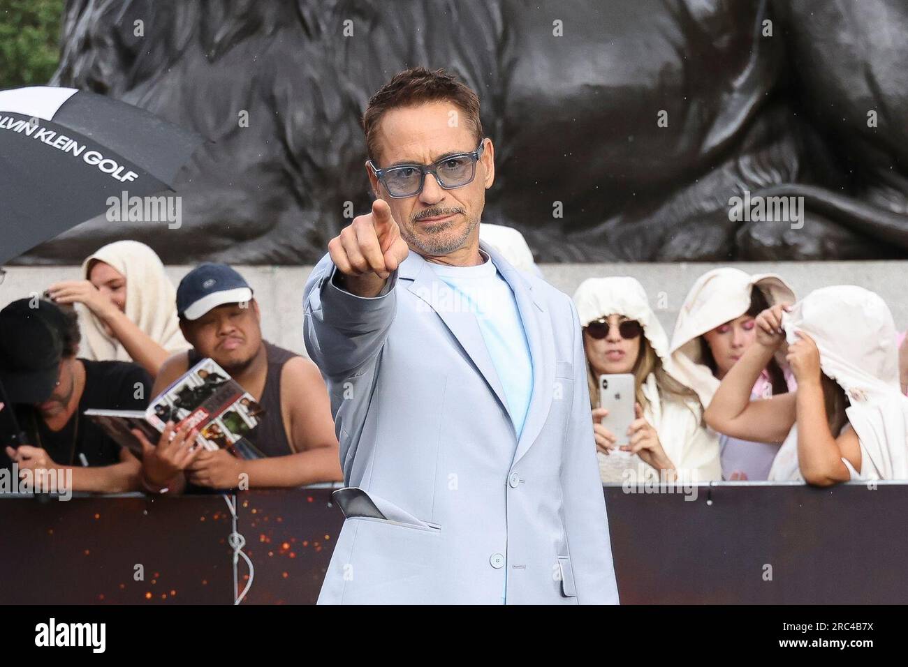 Robert Downey Jr. poses for photographers at the photo call for the ...