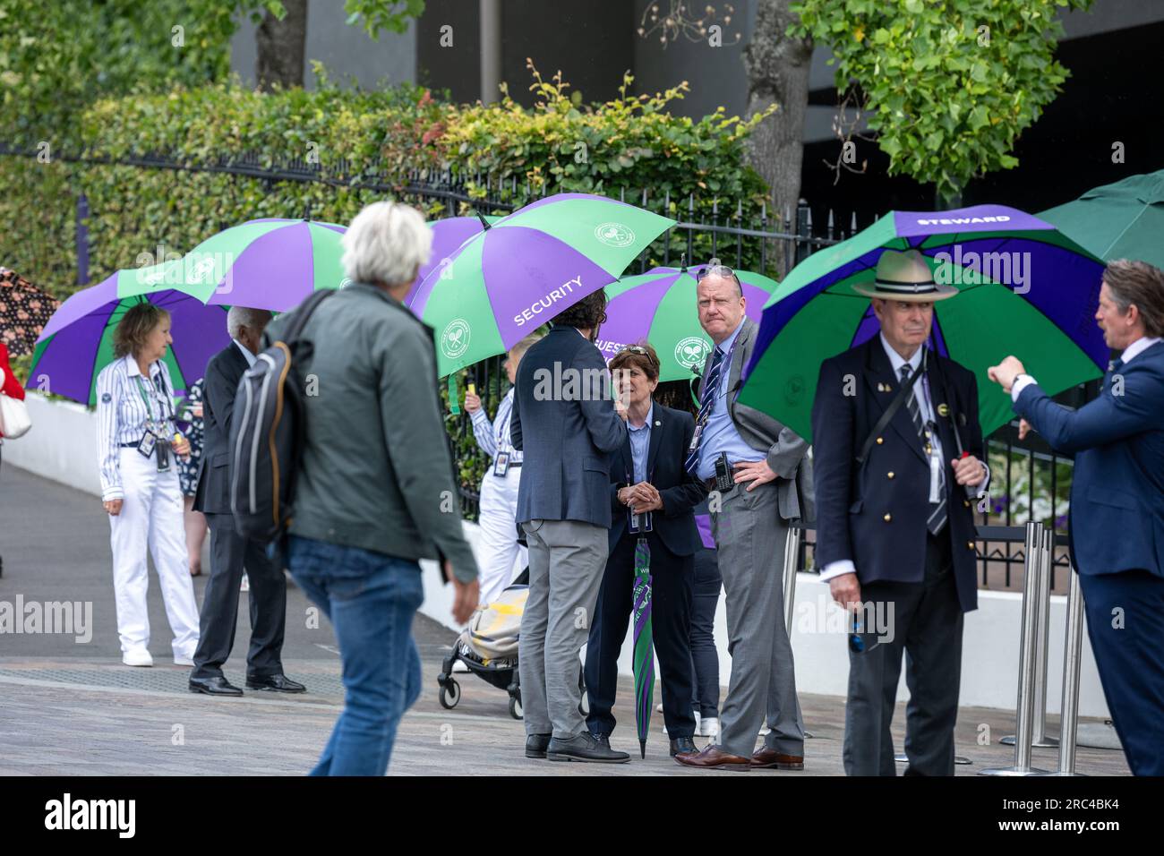 London, UK. 12th July, 2023. UK weather; rain shower at Wimbledon ...