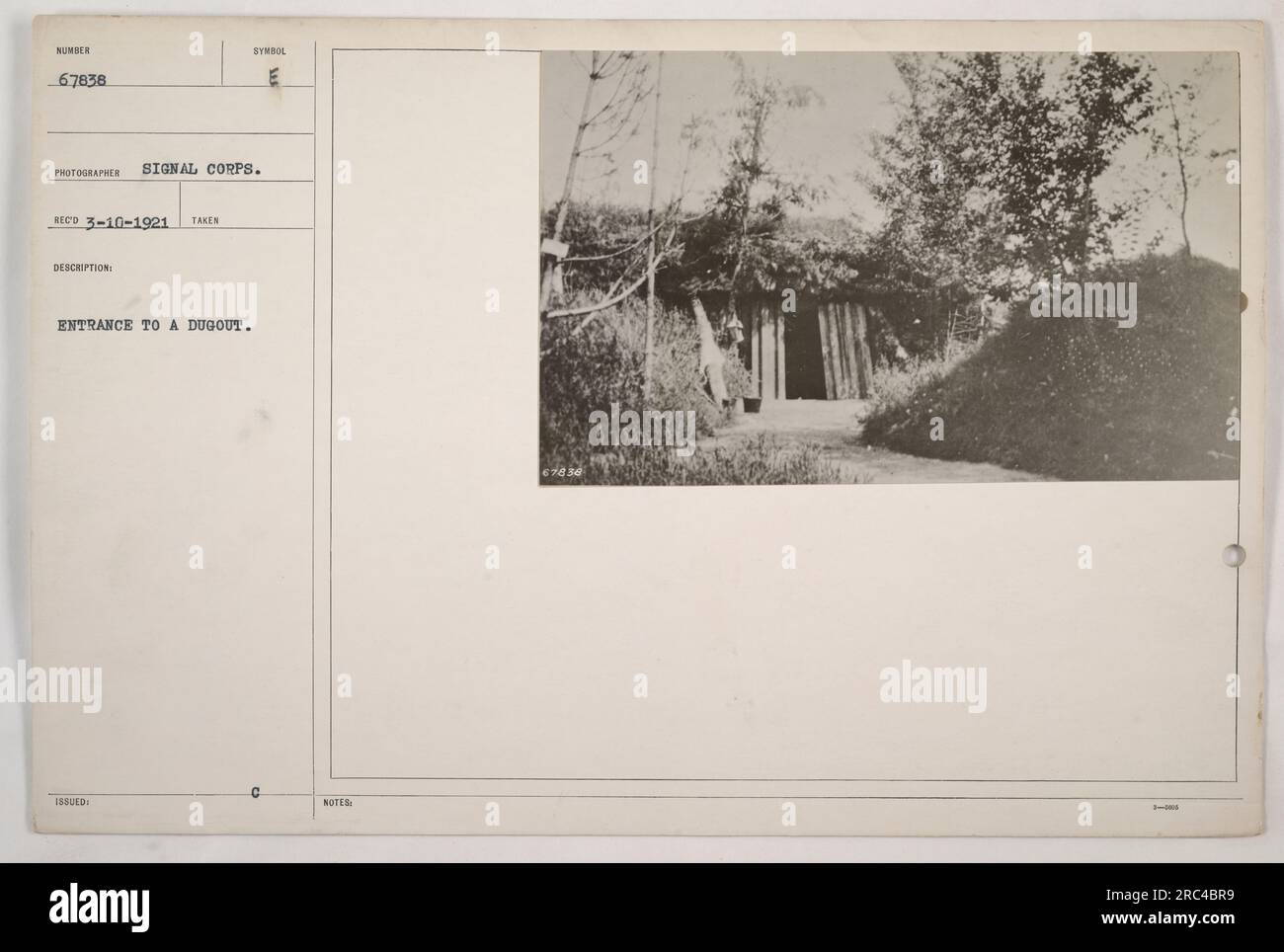 Entrance to a dugout with a soldier standing guard. The image ...