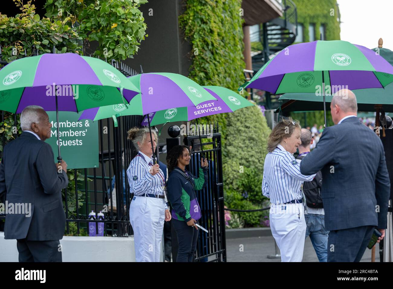 London, UK. 12th July, 2023. UK weather; rain shower at Wimbledon ...