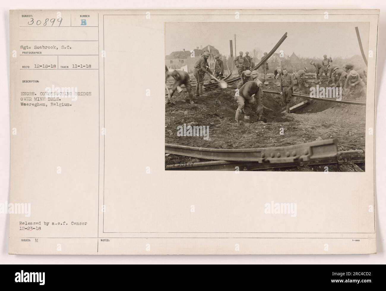 Soldiers from the Engineer Corps are seen constructing a bridge over a ...