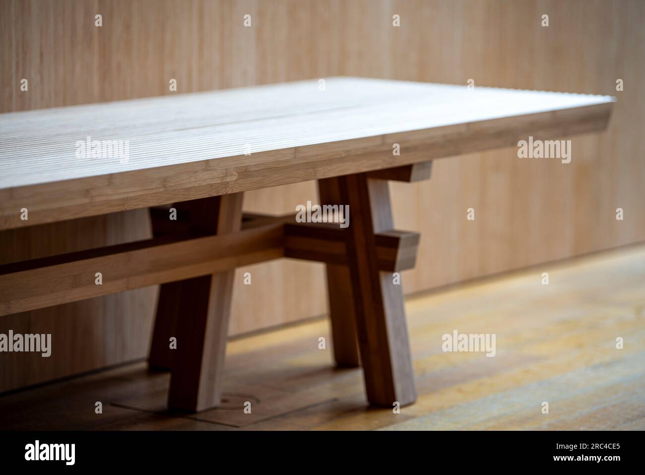Relaxing wooden bench in minimalist design for interior Stock Photo - Alamy