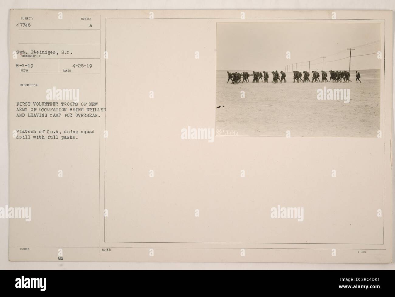 Platoon of soldiers from Company A participating in squad drill with ...